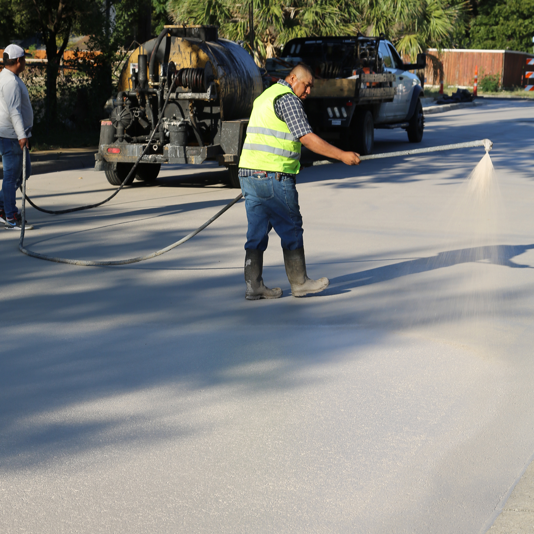Warming Sun Belt cities turn to cool pavement to help mitigate climate ...